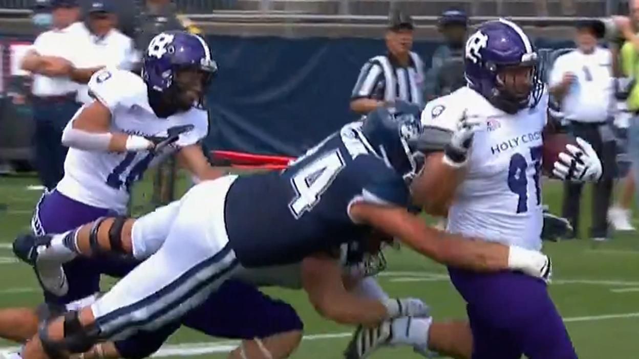 UConn QB throws INT off a helmet, leading to big-man TD - ESPN Video