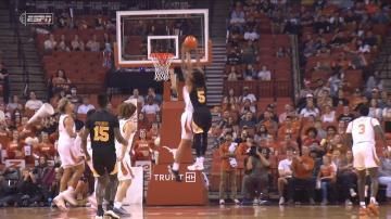 Texas' Dylan Disu rises up for the massive block - ESPN Video