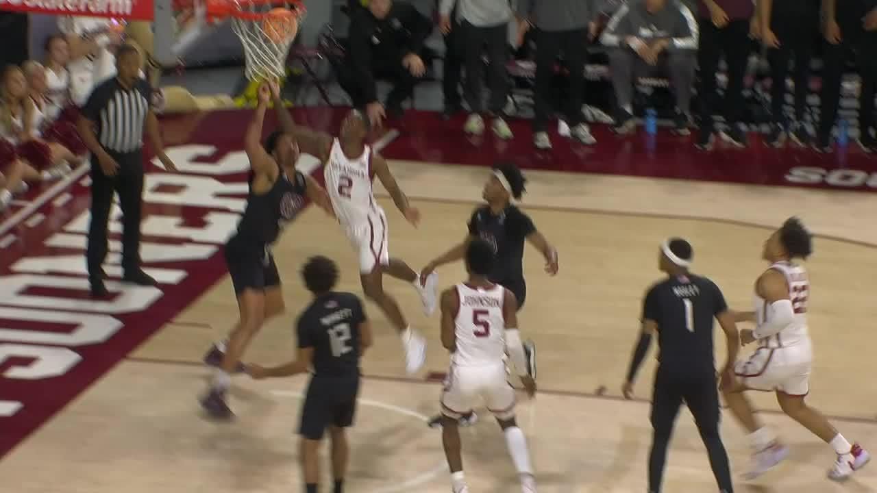 Umoja Gibson somehow lands this driving lay-in - ESPN Video