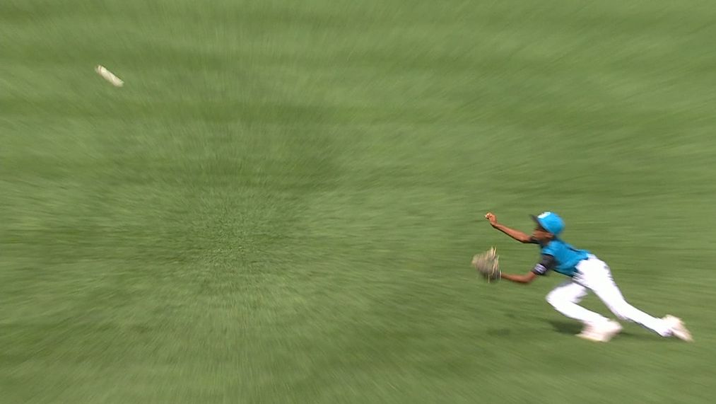 Little Leaguer is pumped after making this incredible diving catch ...