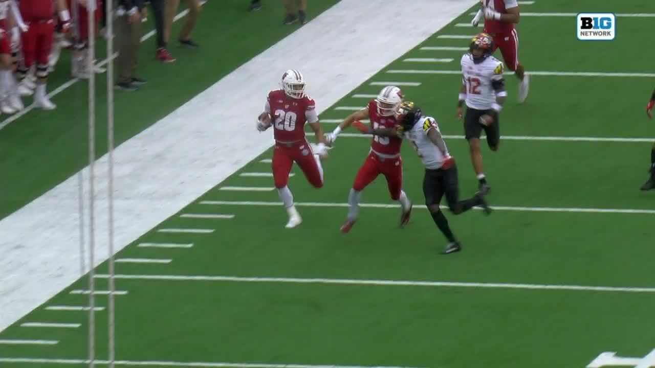 Isaac Guerendo tightropes down sideline for 89-yard Wisconsin TD - ESPN ...