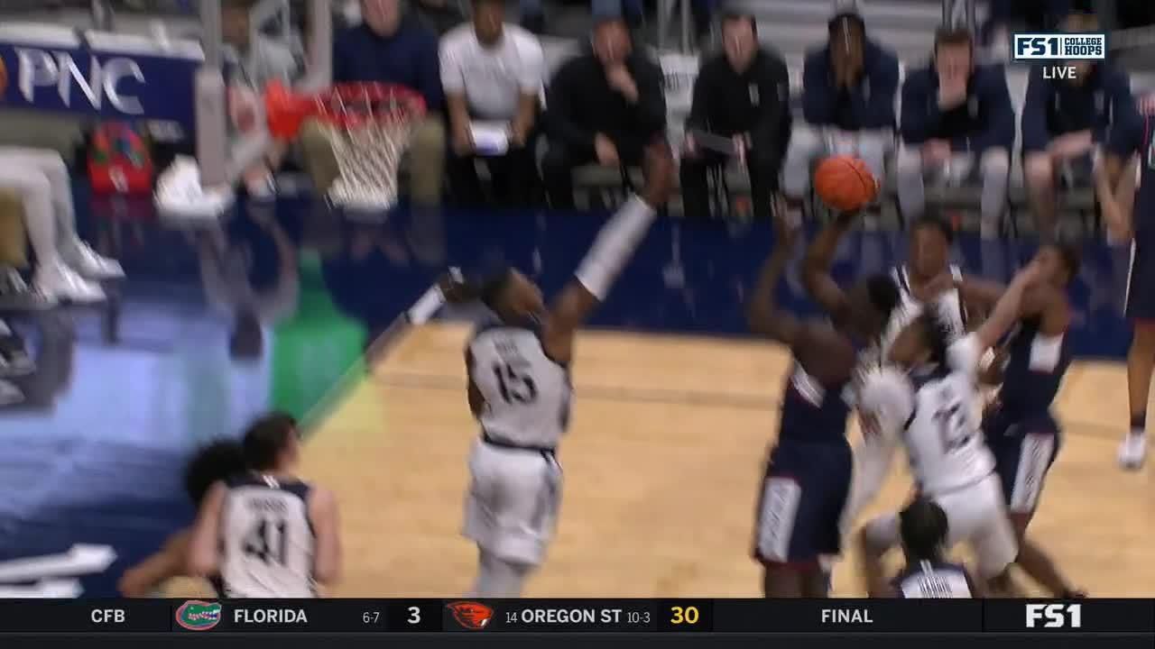 Adama Sanogo absorbs the contact and hits the hook shot and-1 - ESPN Video