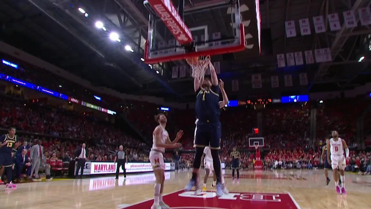 Hunter Dickinson muscles in for a Michigan dunk - ESPN Video