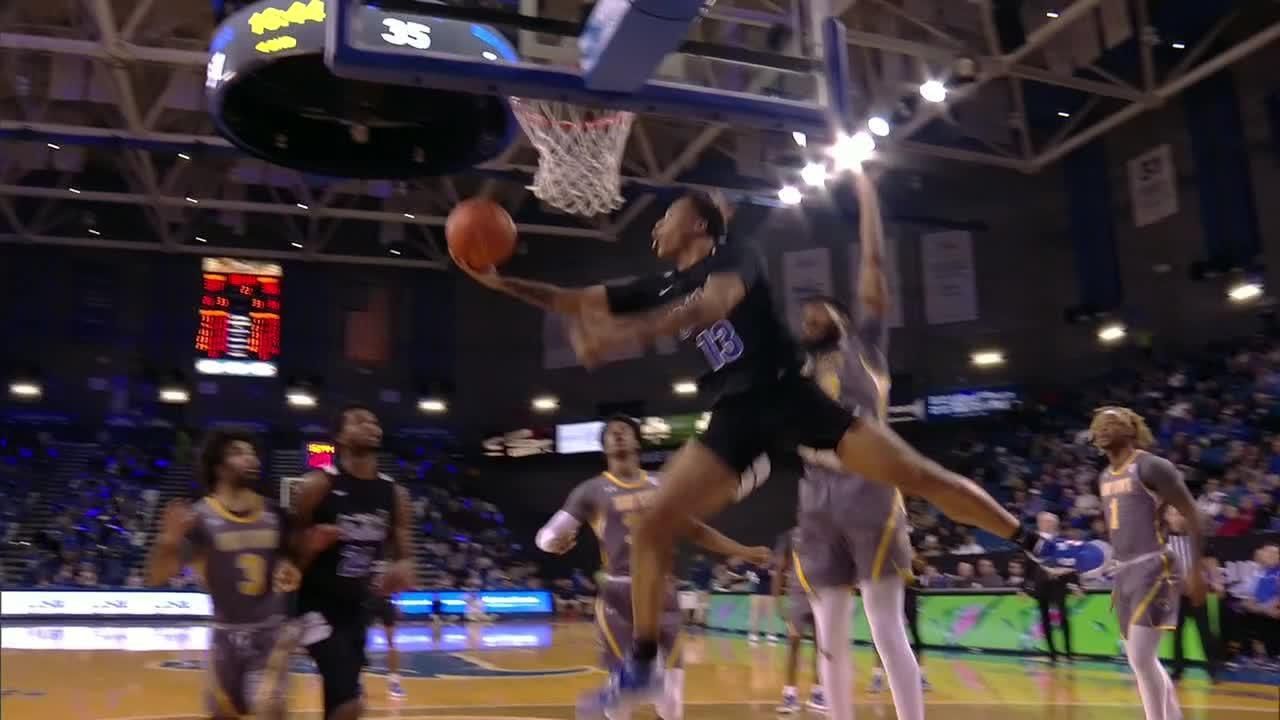 Zid Powell finishes off acroabtic layup - ESPN Video