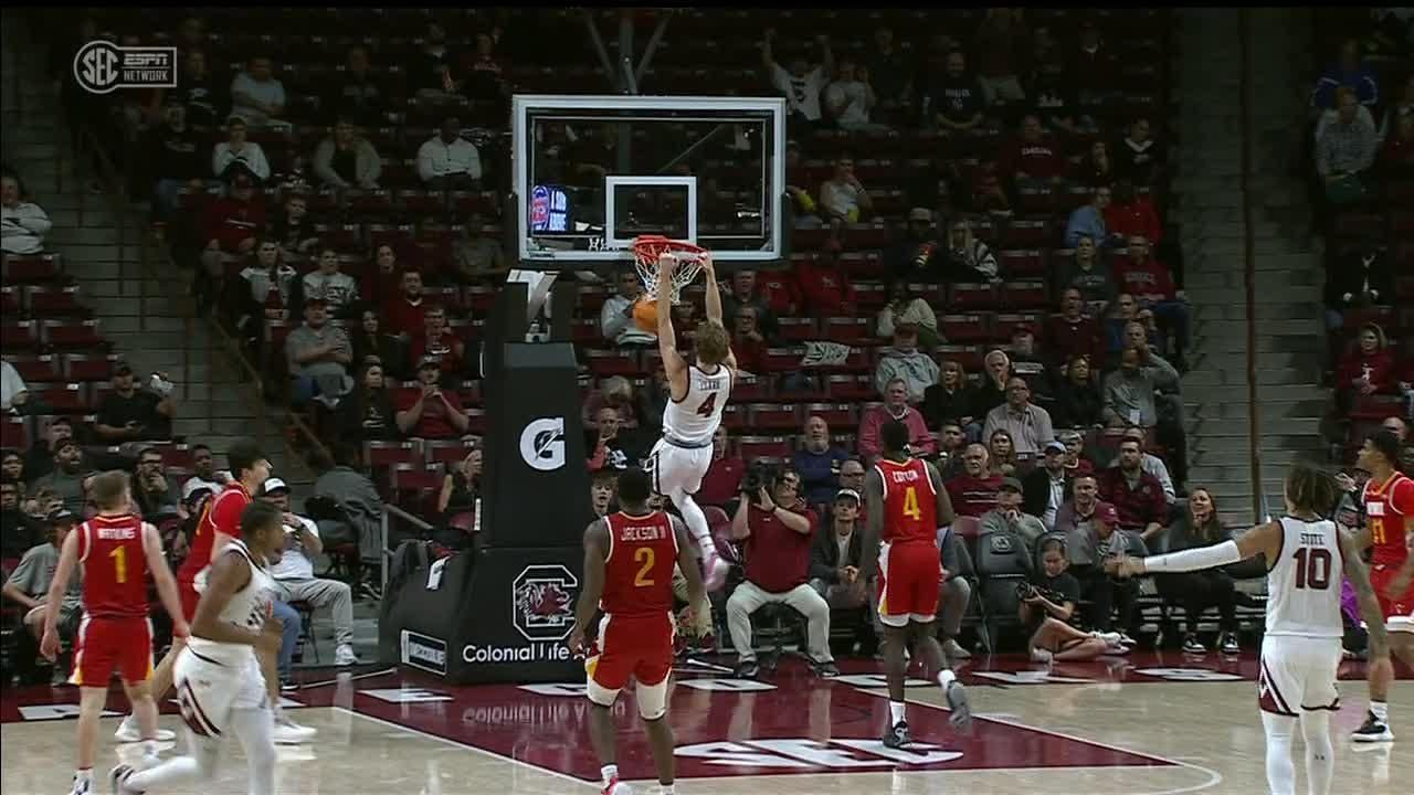 Stephen Clark stuffs home the no-look pass from Ta'lon Cooper for South ...