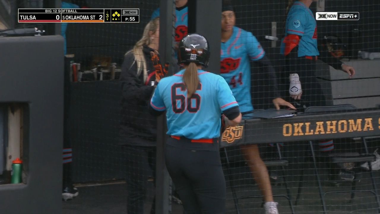 Oklahoma State's Rosie Davis doubles down the line to drive two runs in ...