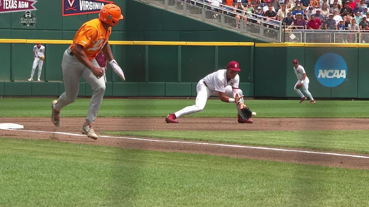 Christian Moore takes off on a fielder's choice for the Vols' first run ...