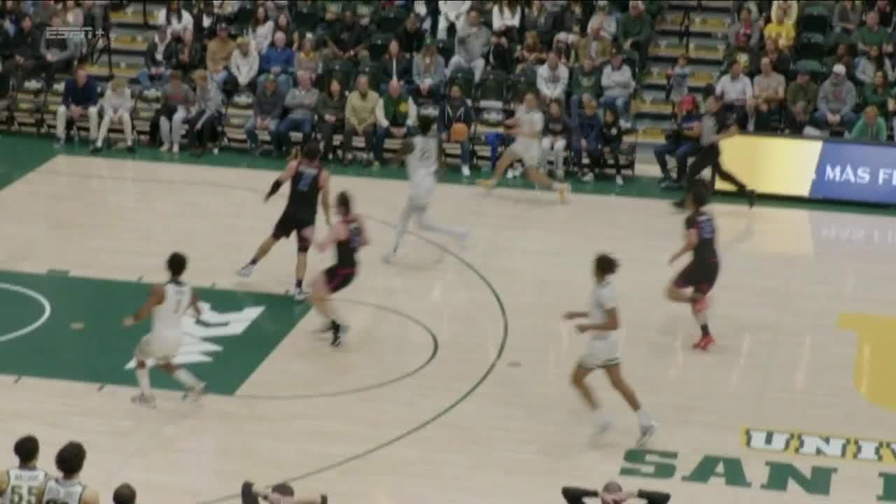 Tyrone Riley IV rocks the rim with flush - ESPN Video