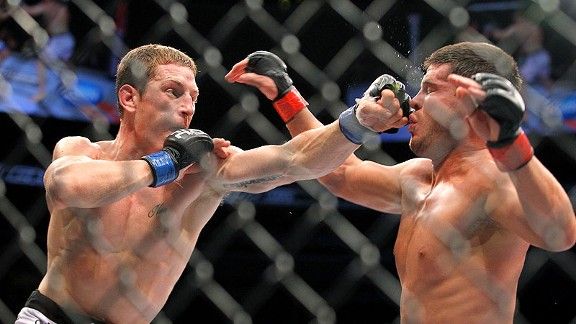 Dominick Cruz offsets Demetrious Johnson to defend title