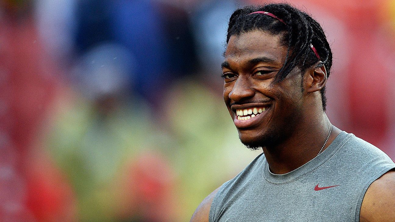Washington Redskins' Robert Griffin III strengthening knee, bonds ...