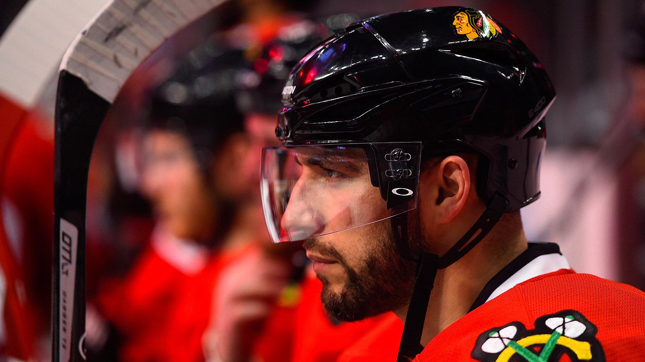 Blackhawks' Michal Rozsival exits with apparent ankle injury - ESPN