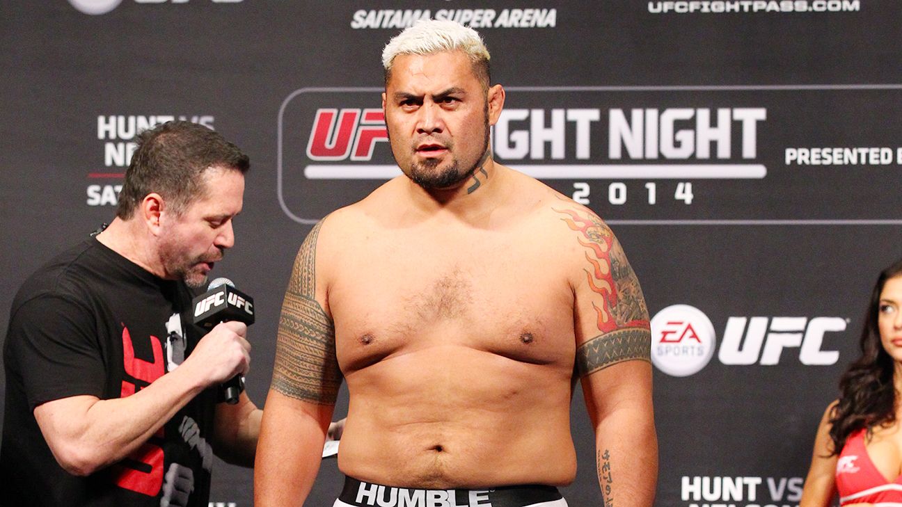 Knee injury knocks Cain Velasquez from title defense against Fabricio ...