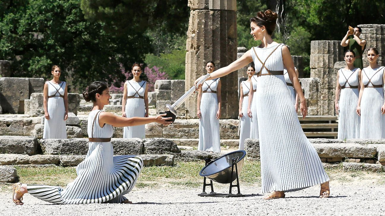 Flame for Rio Olympics burning, starts journey to Brazil - ESPN