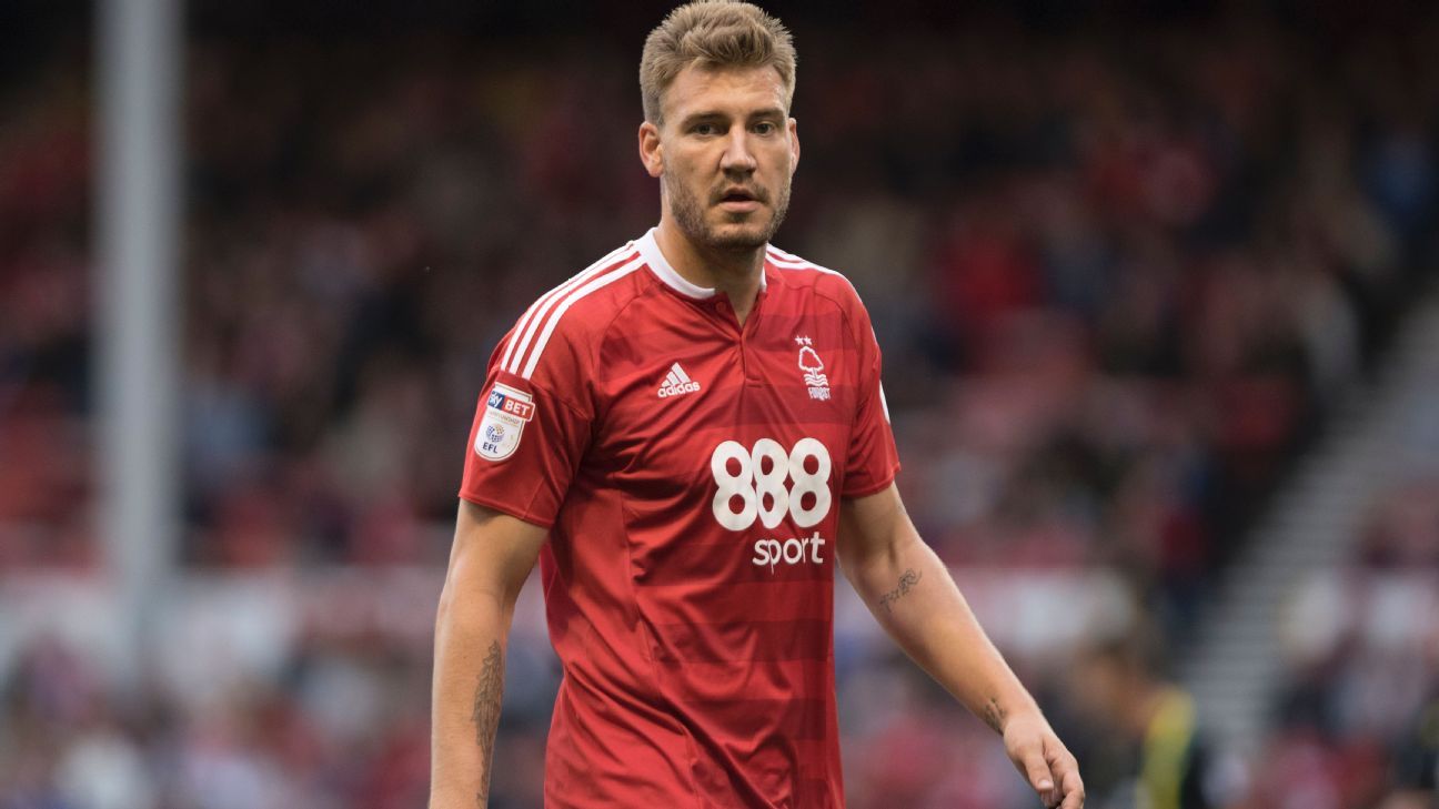 Nicklas Bendtner limbers up for Arsenal return with dustbin challenge ...