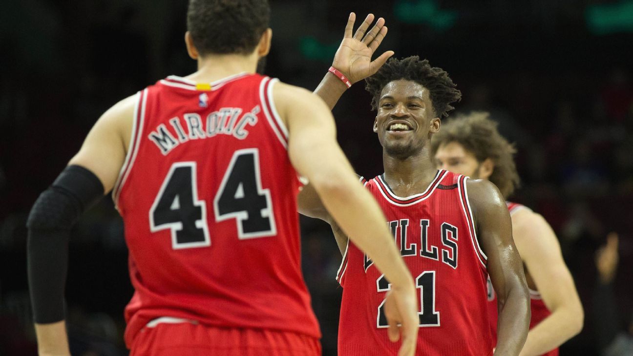 Jimmy Butler, Bobby Portis enjoy viral high-five moment - ESPN ...