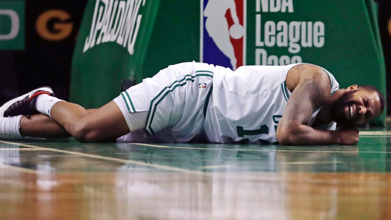 Play goes on as Celtics' Marcus Morris falls hard after dunk - ESPN