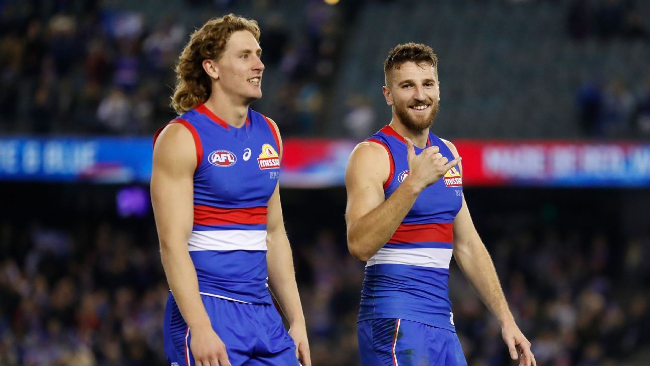 AFL Round Table: Who wins Friday's Dogs vs. Dees blockbuster? Best ...