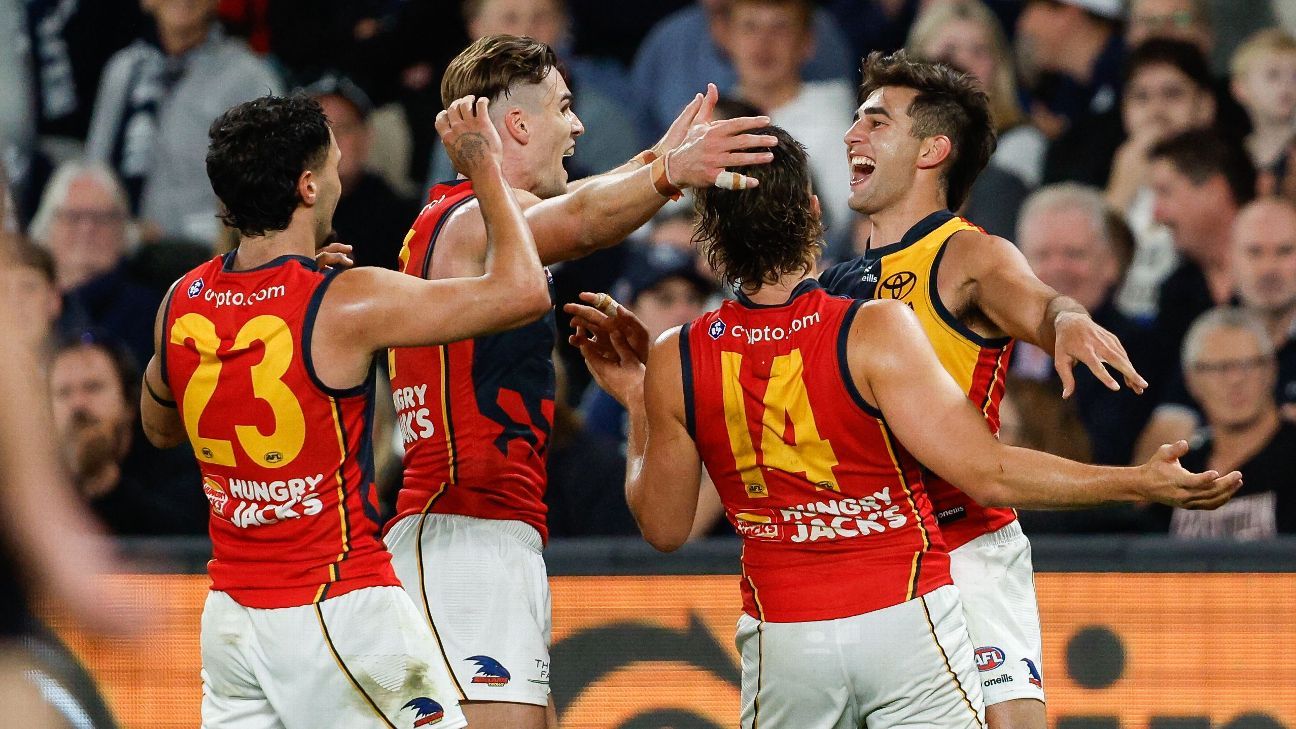 Crows rally to beat Blues for first win of the season - ESPN